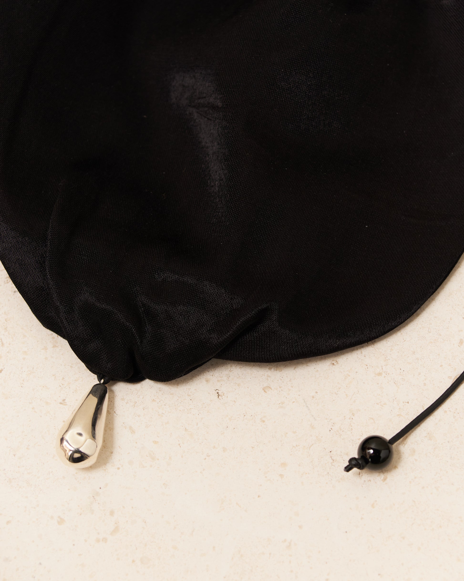 Noir Onyx Teardrop Pouch – Dilettante